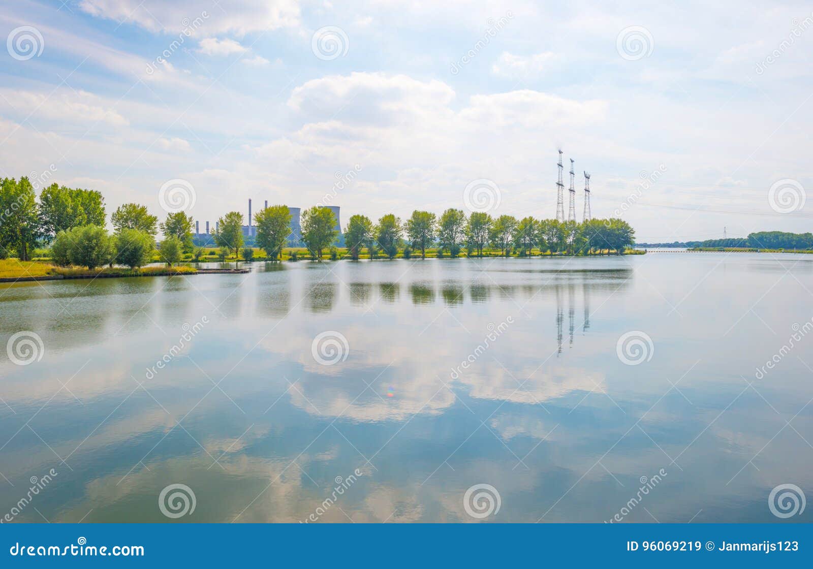 Stream Flowing through a Tree Lined Field in Sunlight Stock Image ...