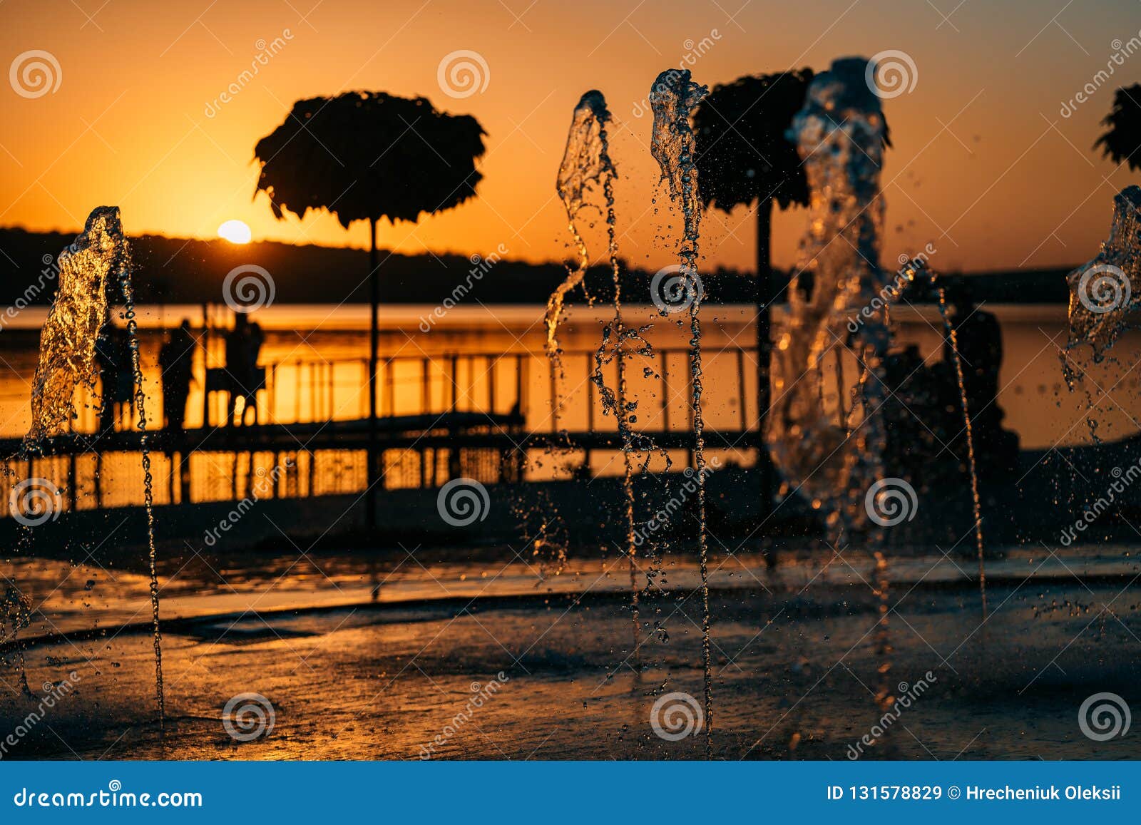 Stream Of A Fountain Splashes Water, Sunset Stock Image - Image of ...