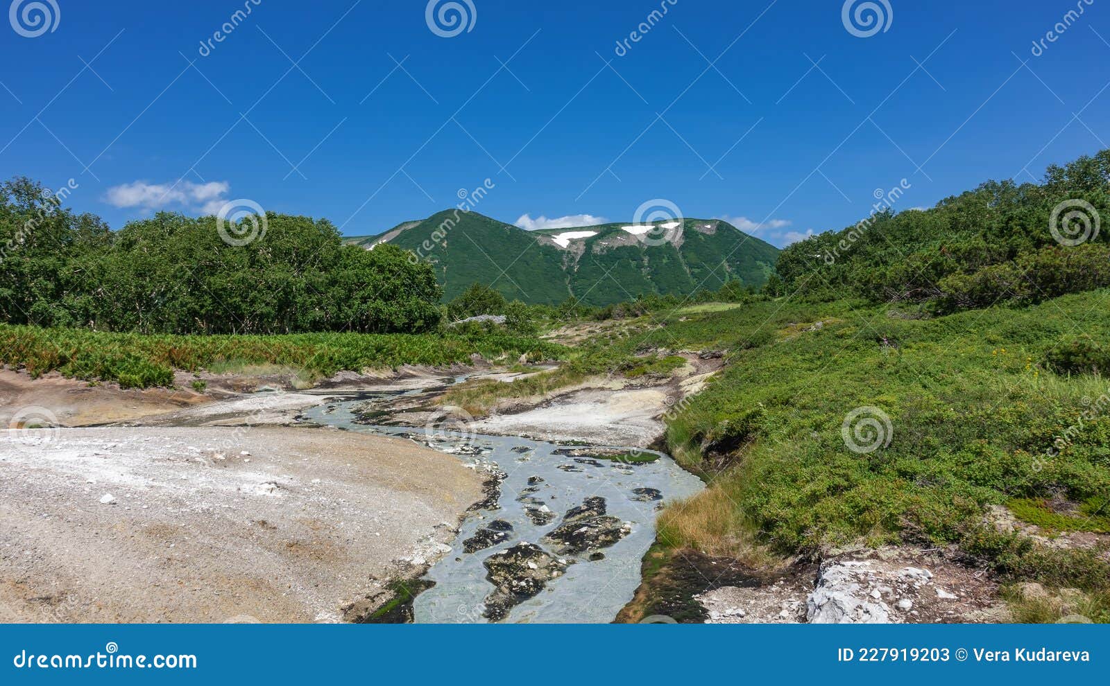 A Stream from a Hot Natural Spring Flows in the Caldera of an Extinct ...