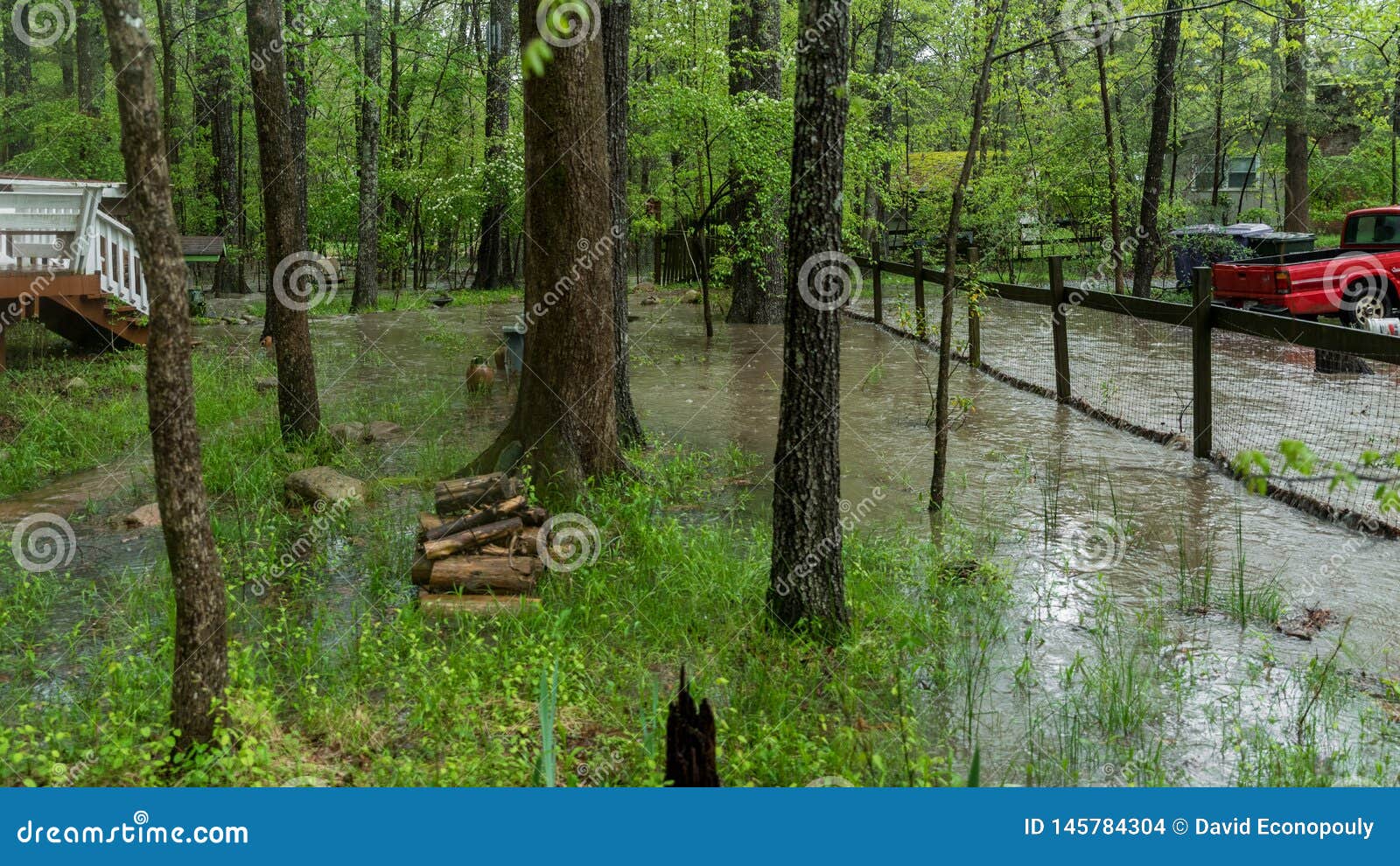 Stream Overflowing and Flooding Yard after a Rainstorm Stock Photo ...