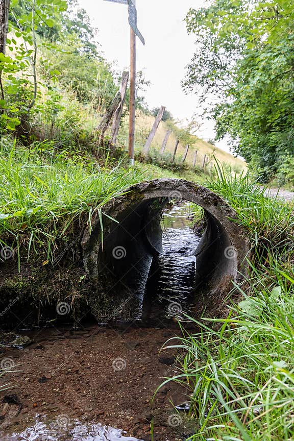 The Stream Runs through the Pipe Stock Photo - Image of environment ...