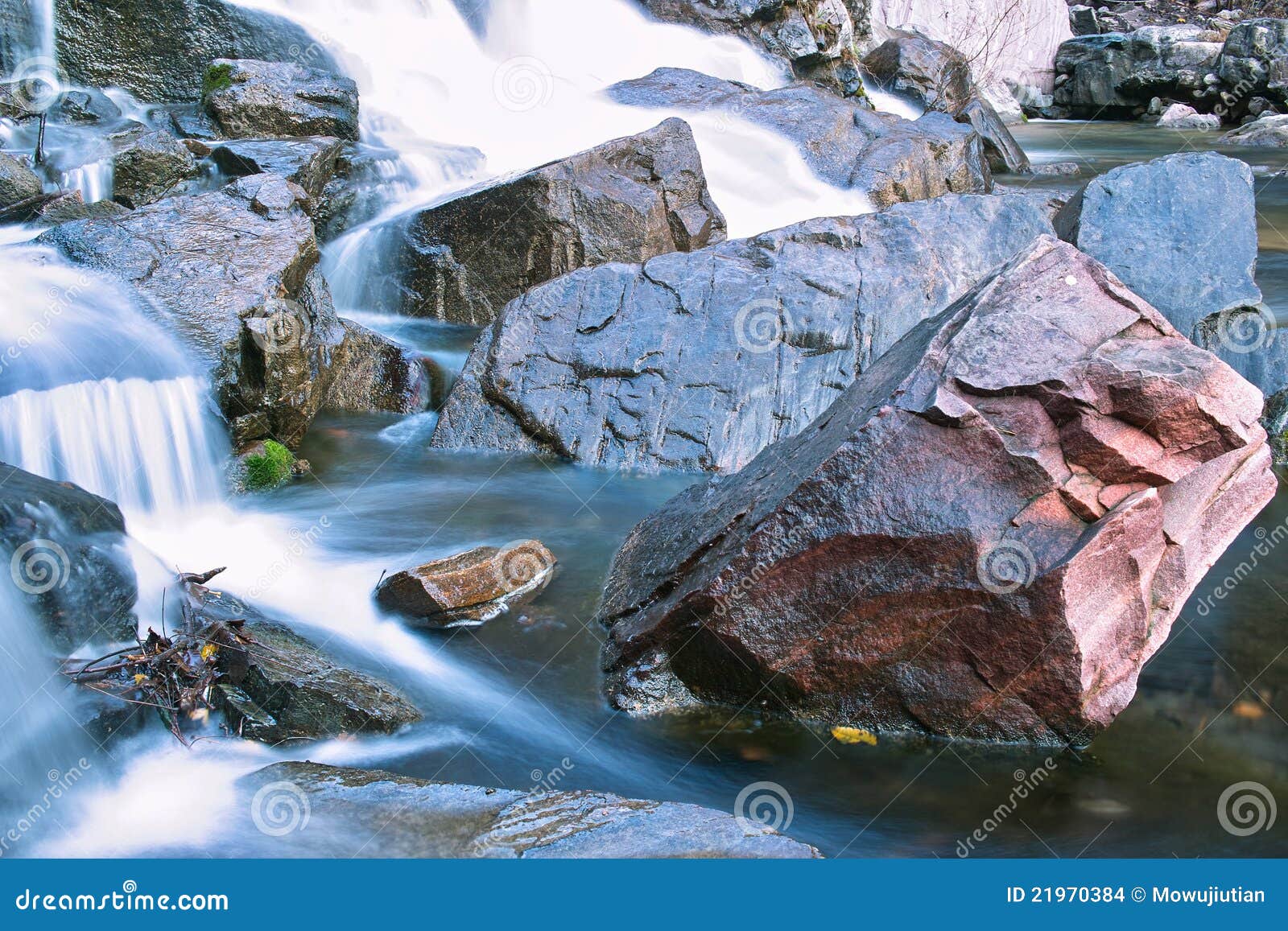 A Stream Rushing Over Large Rocks, Lined By A Forest On Weller Lake ...