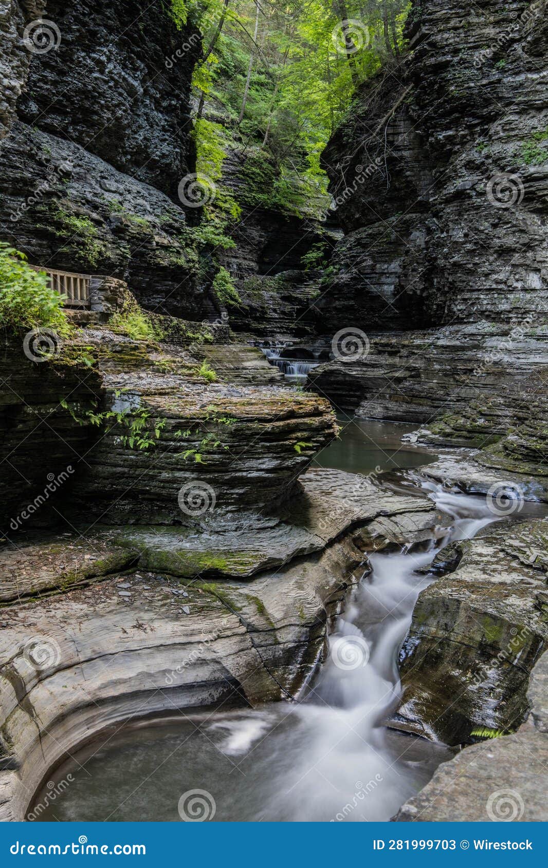 Stream of Water Cascades Over a Rocky Landscape Stock Image - Image of ...