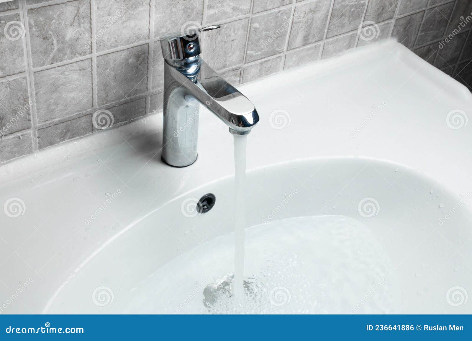 Stream of Water from Faucet To Sink in the Bathroom Stock Photo - Image ...
