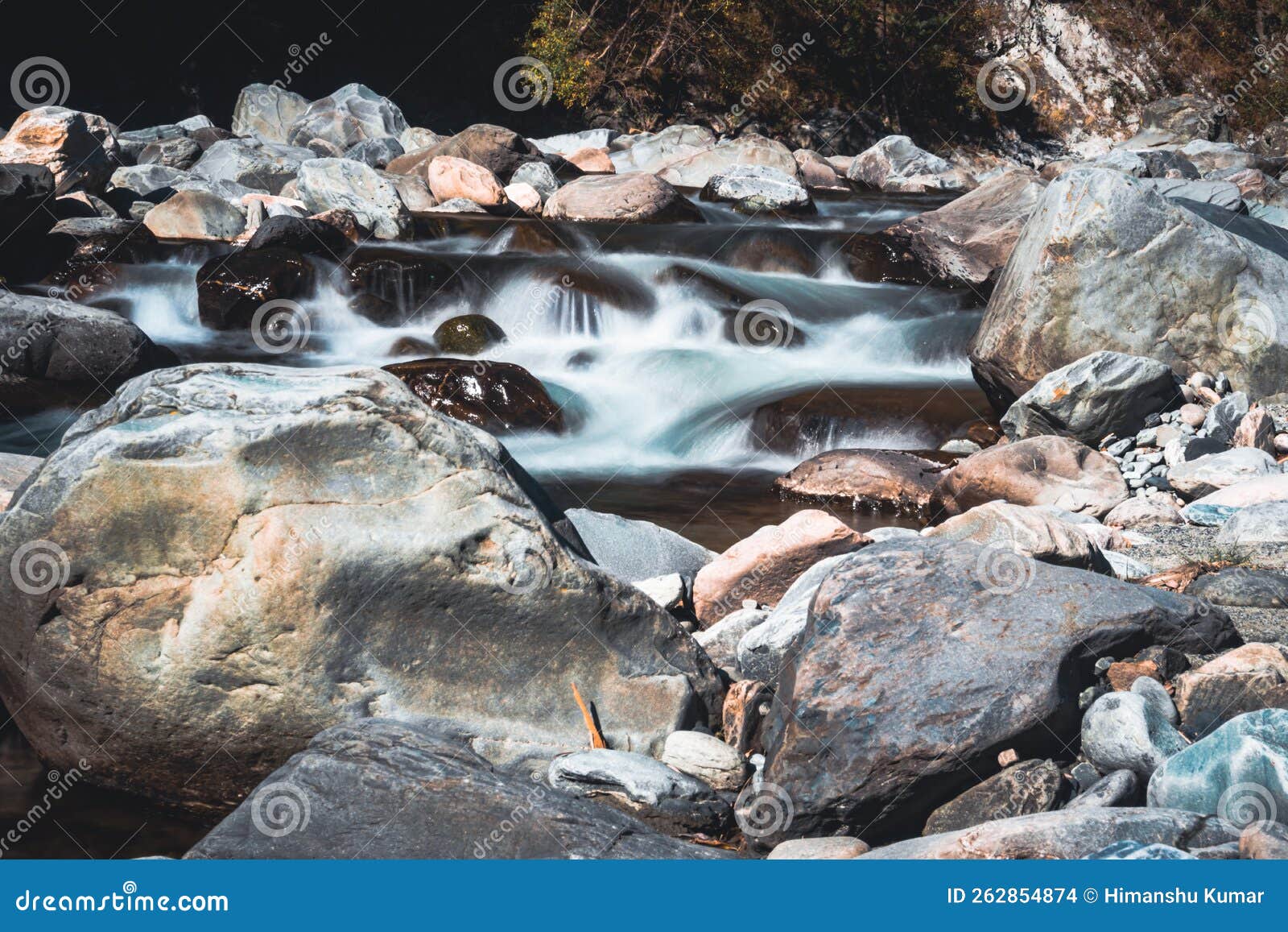 Stream of Water Flowing through Large Rocks Stock Photo - Image of ...