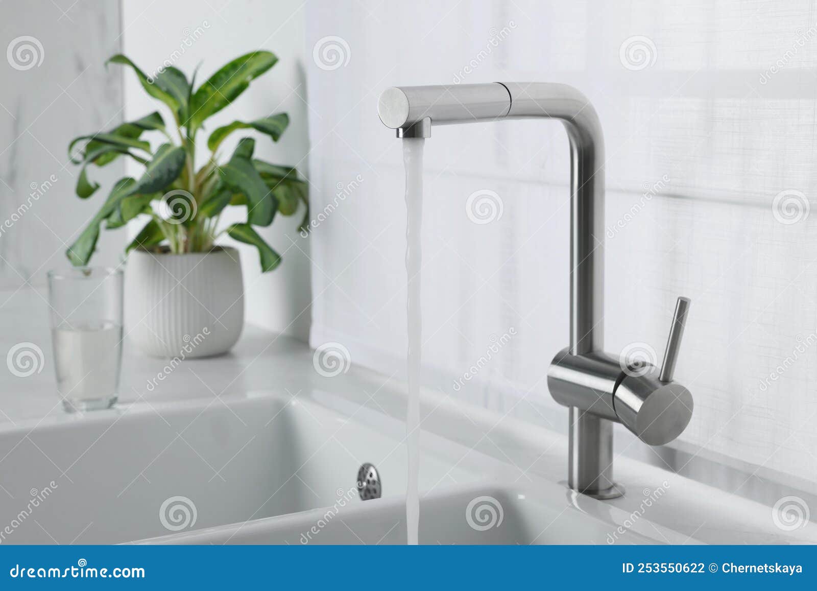 Stream of Water Flowing from Tap in Kitchen Stock Photo - Image of ...