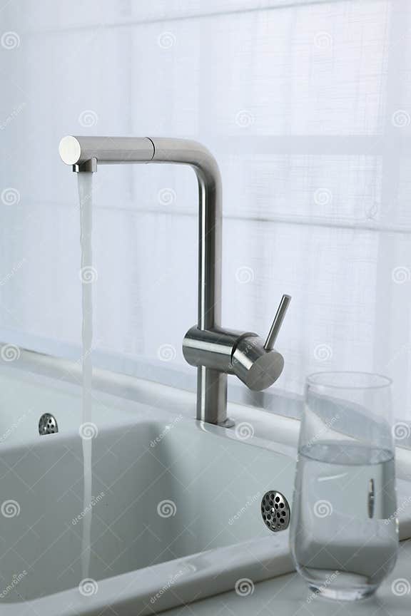 Stream of Water Flowing from Tap in Kitchen Stock Photo - Image of ...