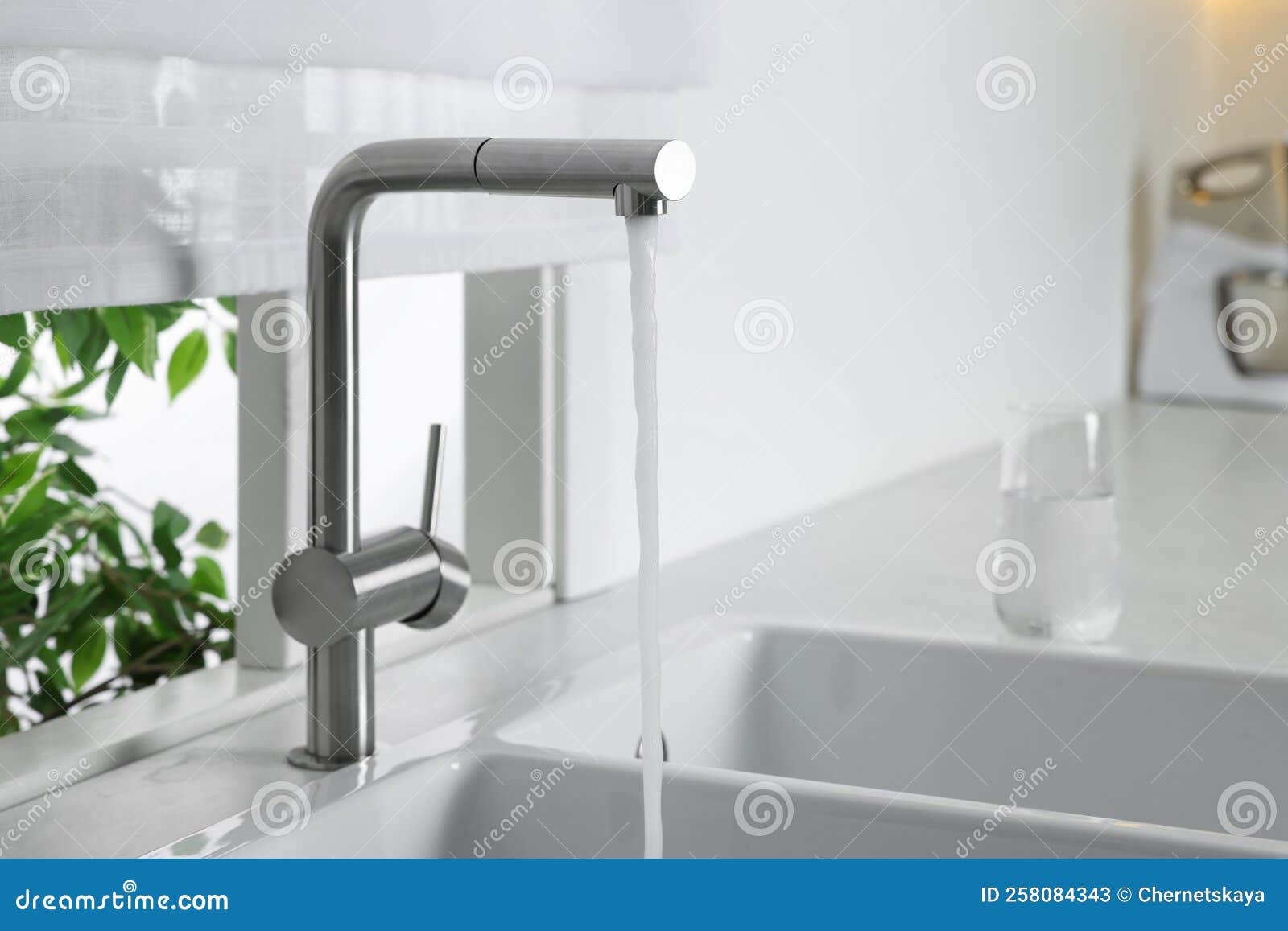 Stream of Water Flowing from Tap in Kitchen Stock Image - Image of ...