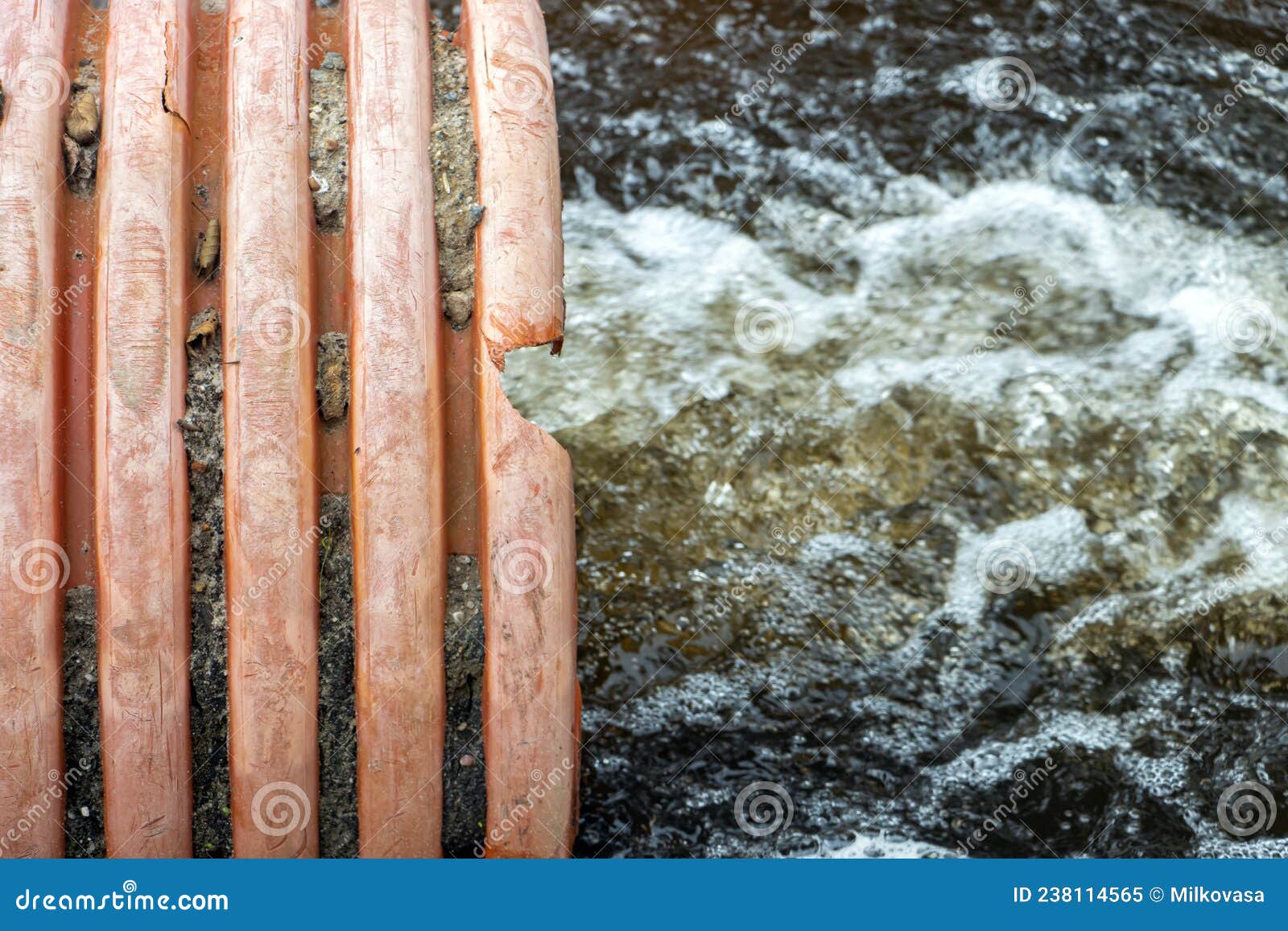A Stream of Water Flows from a Large Flexible Pipe - Hose Stock Image ...