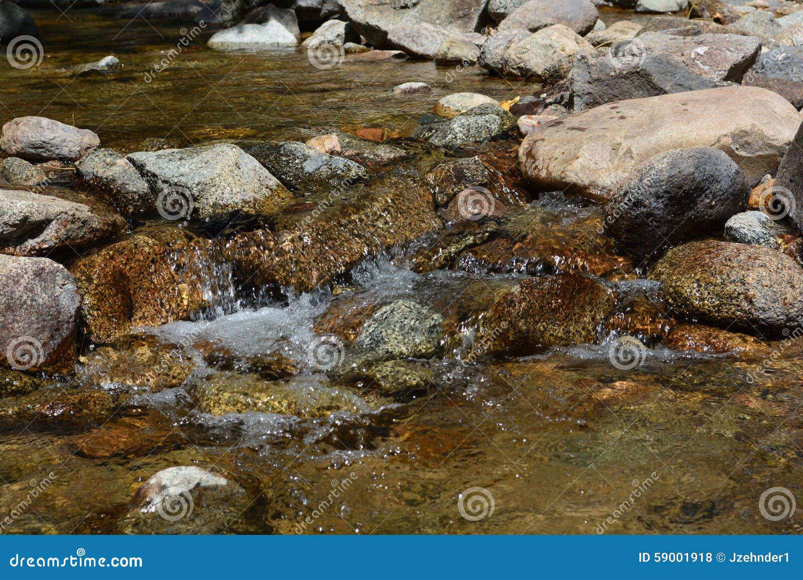 Stream Water Flows Over Rocks Stock Photo - Image of stone, water: 59001918