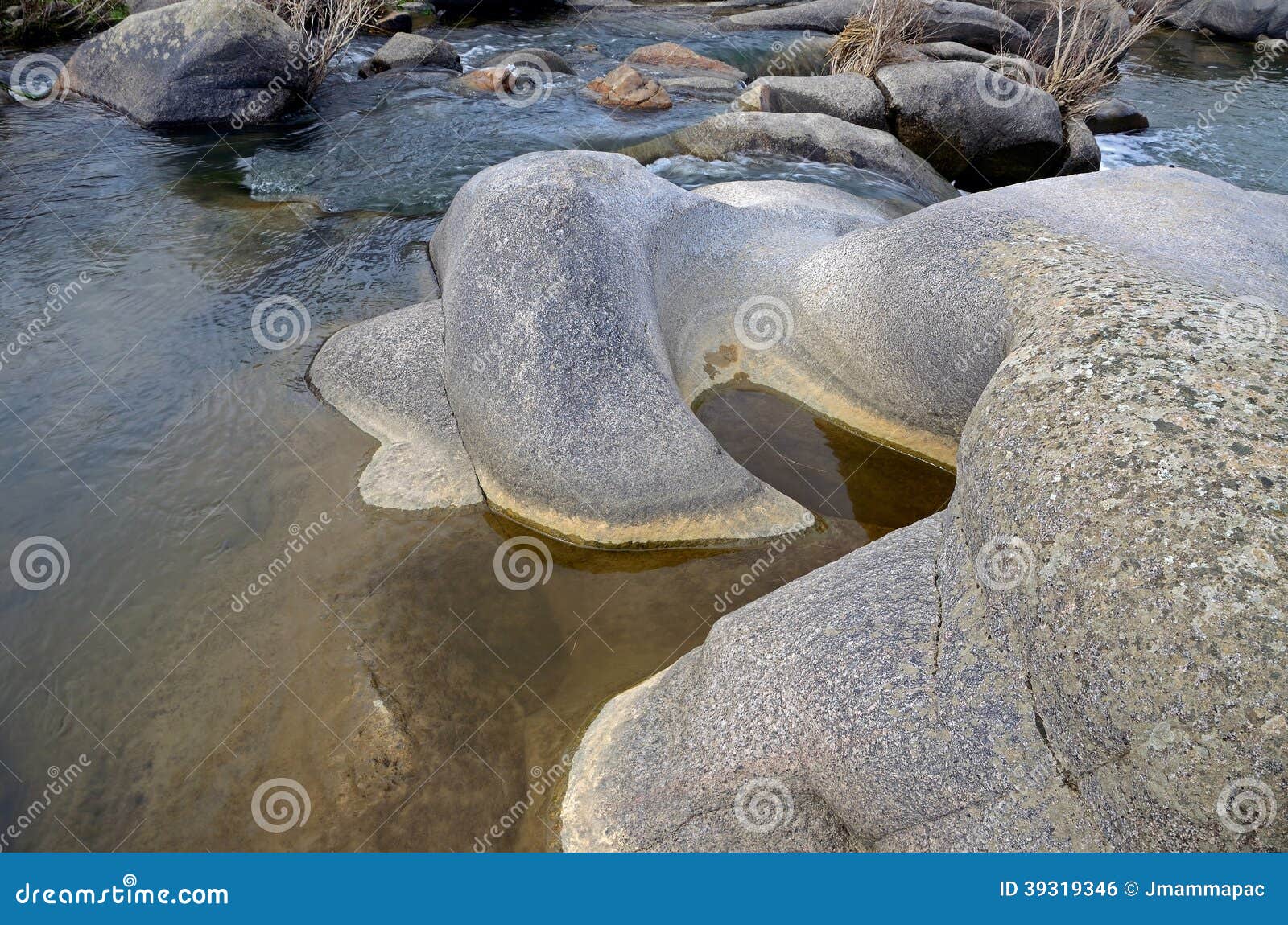 Stream of water and rocks stock photo. Image of rock - 39319346