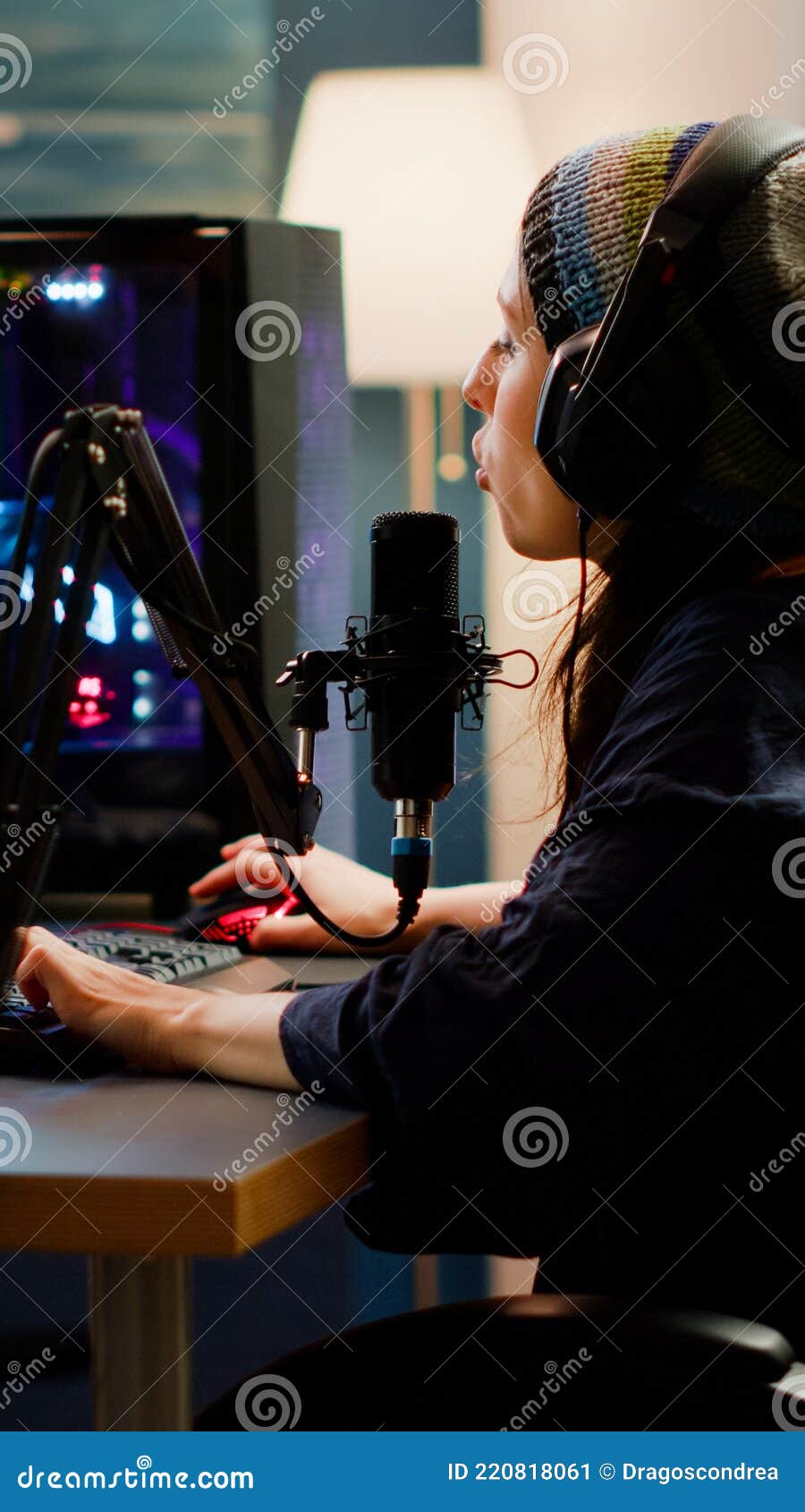 Streamer Putting on Headphone and Start Talking into Microphone Stock ...