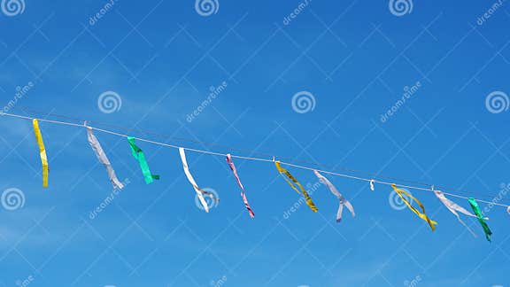 Streamers on a line stock image. Image of yellow, white - 144600817