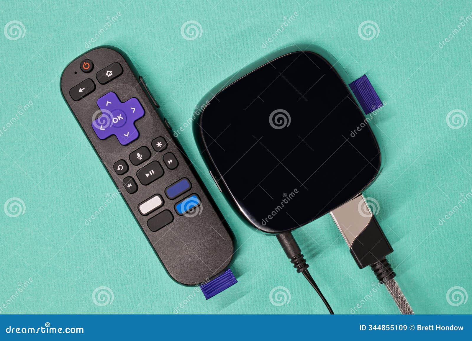 Streaming Media Player Remote Control on Blue Background. Stock Image ...