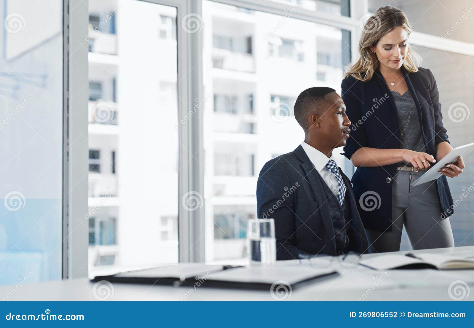 Streamlining Tasks with the Smartest of Technology. Two Businesspeople ... Streamlining Tasks with the Smartest of Technology. Two Businesspeople ...