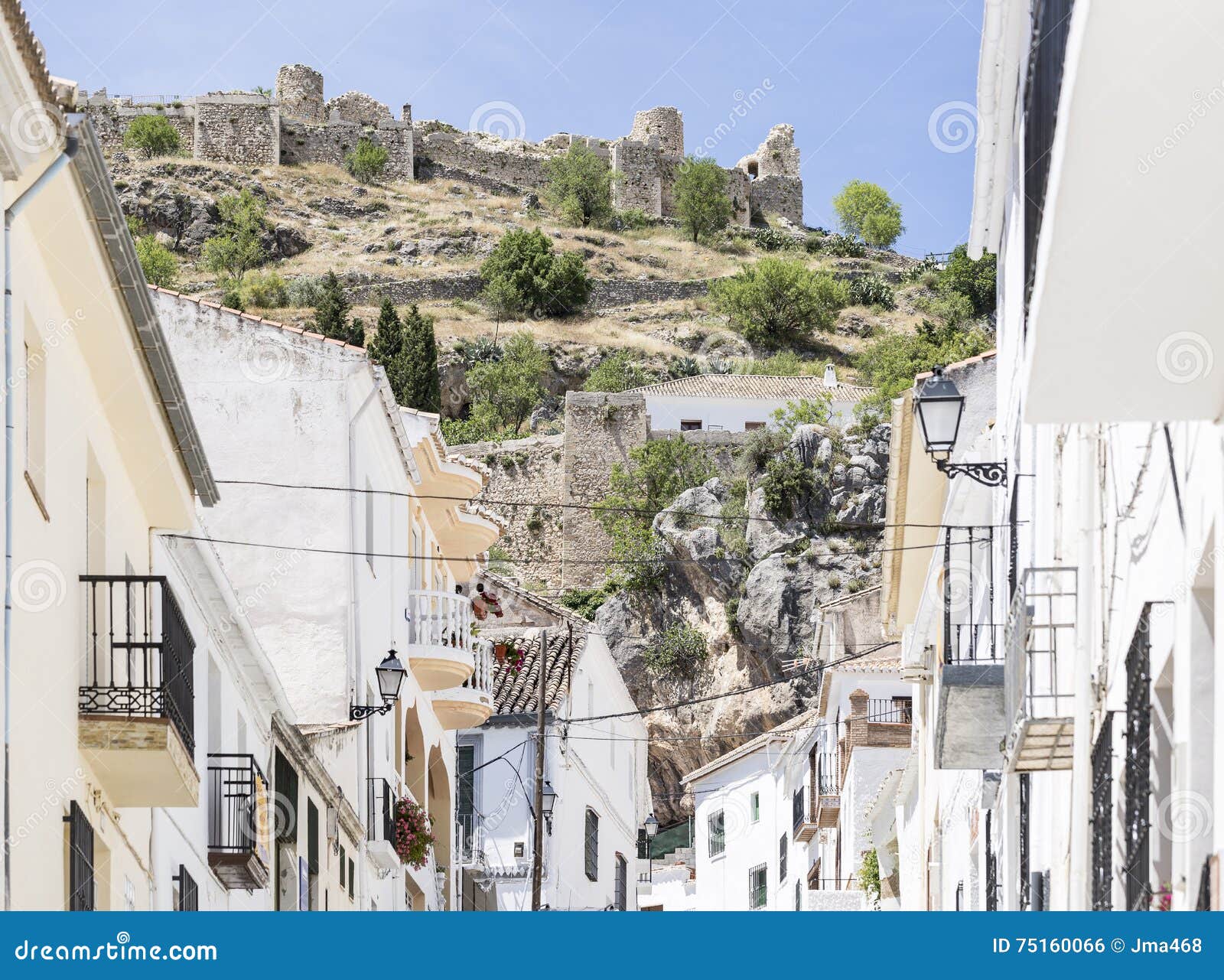 Street and the Ancient Castle of Moclin, Granada, Spain Stock Photo ...