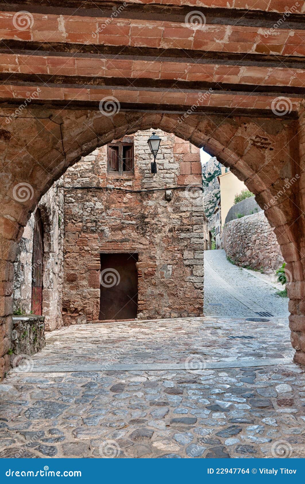 Street with an Arch, Collbato, Spain Stock Photo - Image of abstract ...