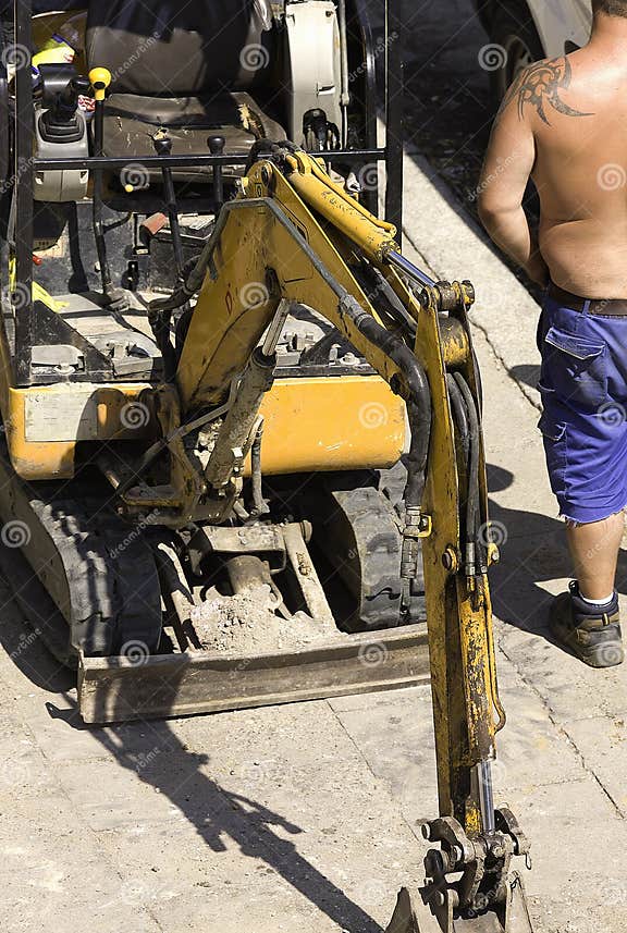 Street builder at work stock photo. Image of constructor - 76797162