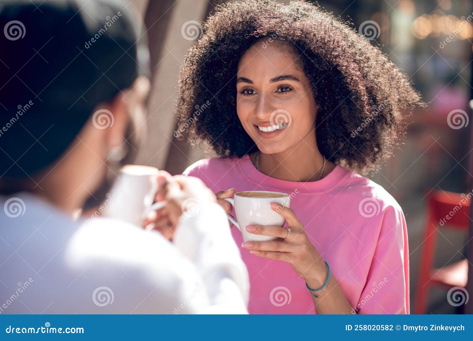 Two Young People Having Coffee at the Street Cafe Stock Photo - Image ...