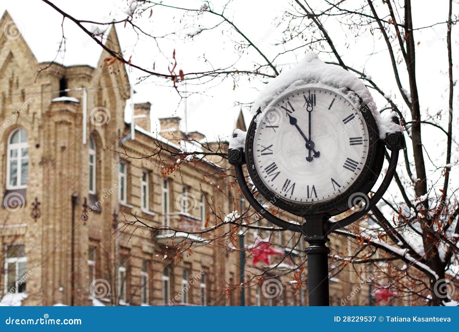 Street clock in the snow stock image. Image of shift - 28229537