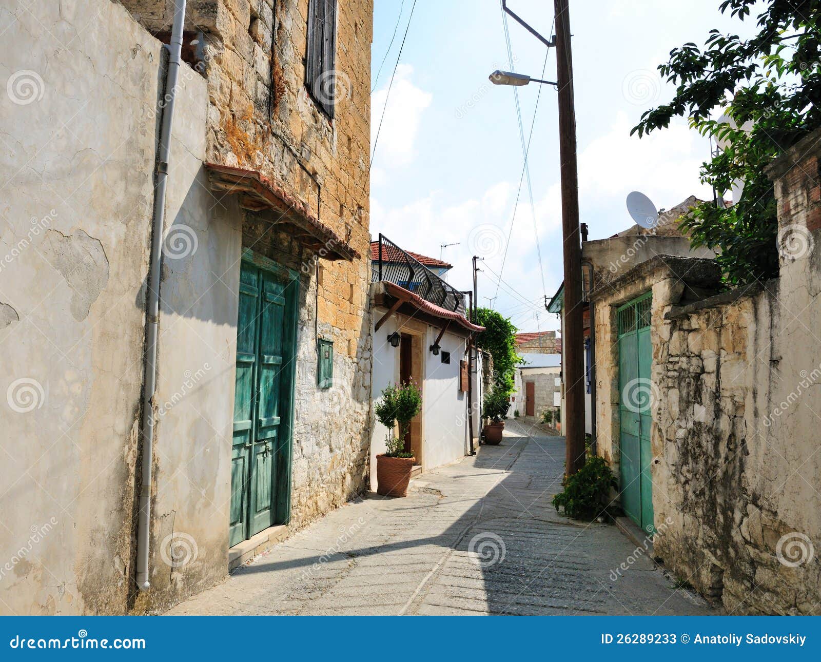 Street in Cyprus village stock image. Image of street - 26289233
