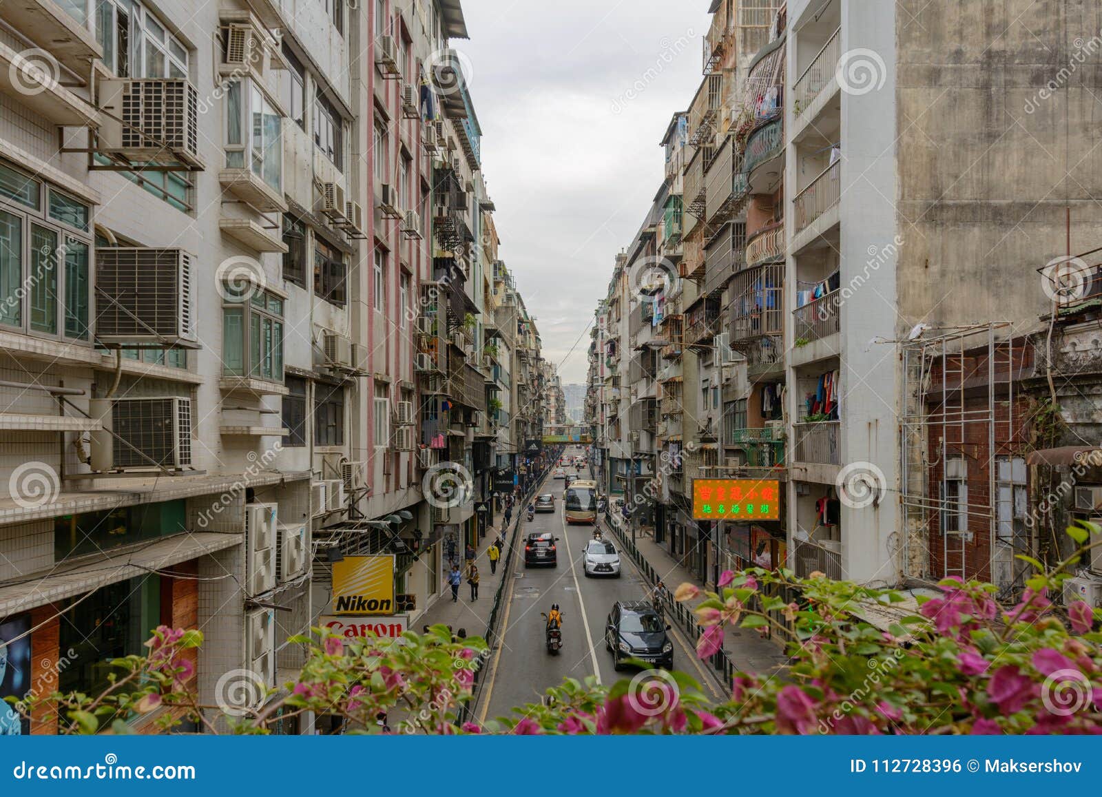 A street in downtown Macau editorial photo. Image of street - 112728396