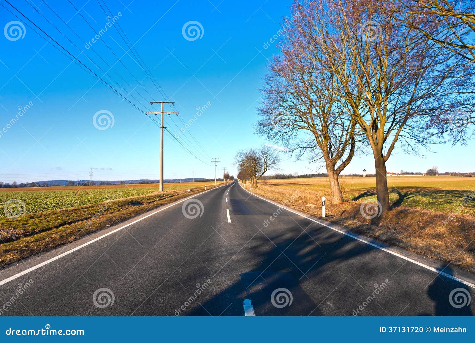 Street with Electric Power Lines Stock Photo - Image of buildings ...