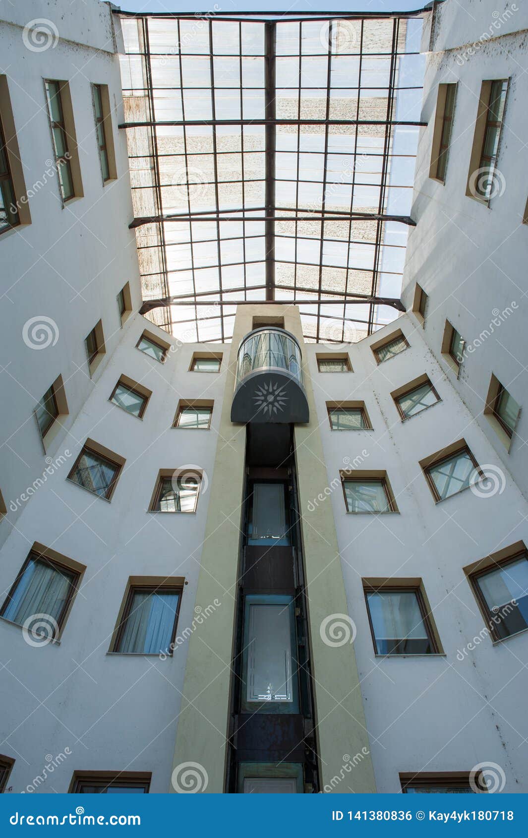 Street Elevator in the Building Rises To the Top, Surrounded by Windows ...