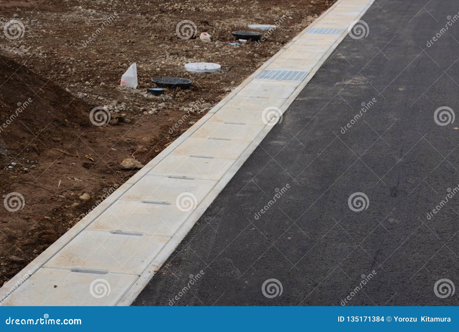 Street gutter construction stock photo. Image of housing - 135171384