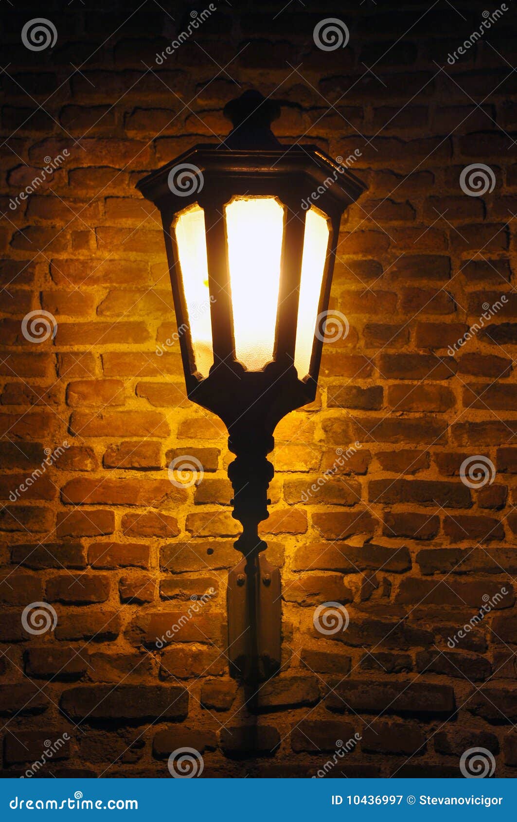 Street lamp stock image. Image of shapes, brick, night - 10436997