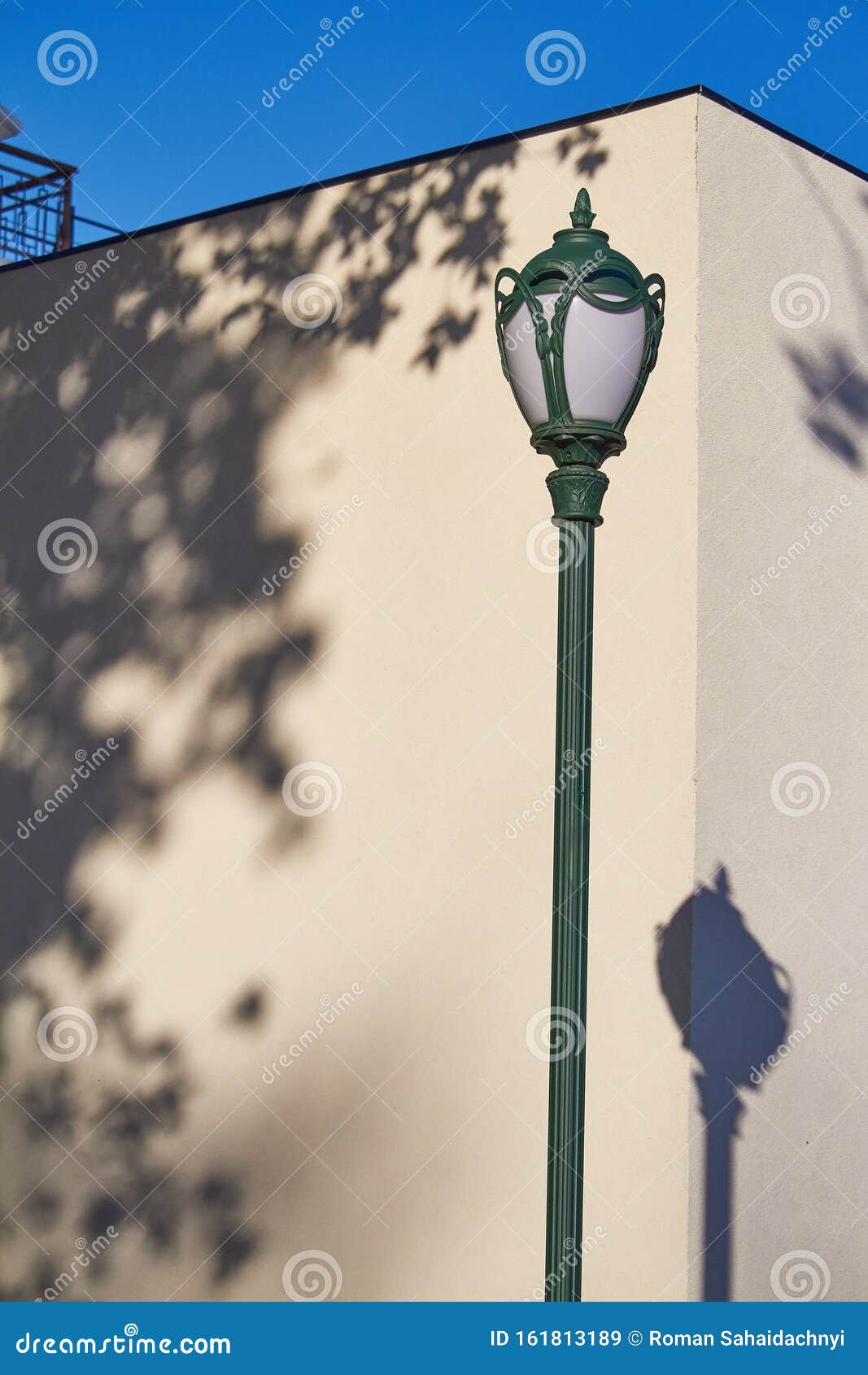 Street Lamp and Its Shadow on a White Wall Background Stock Image ...