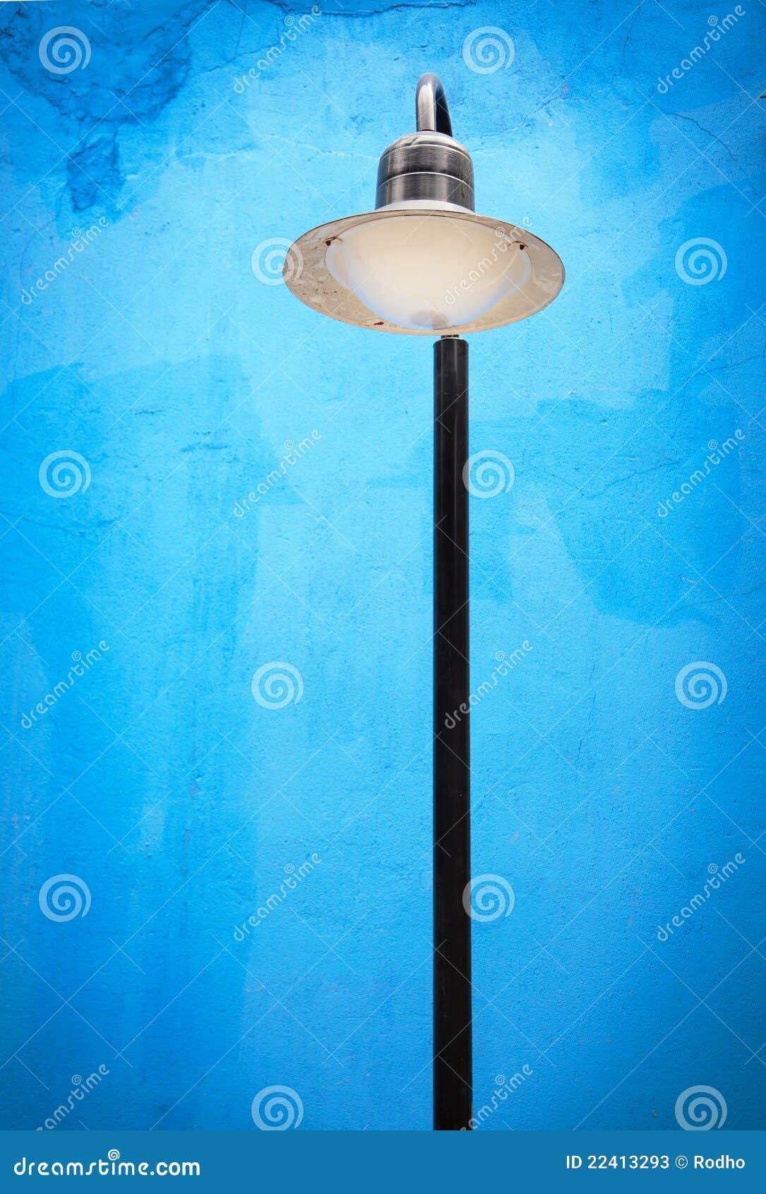 Street Lamp Post Against Blue Wall Background Stock Image - Image of ...