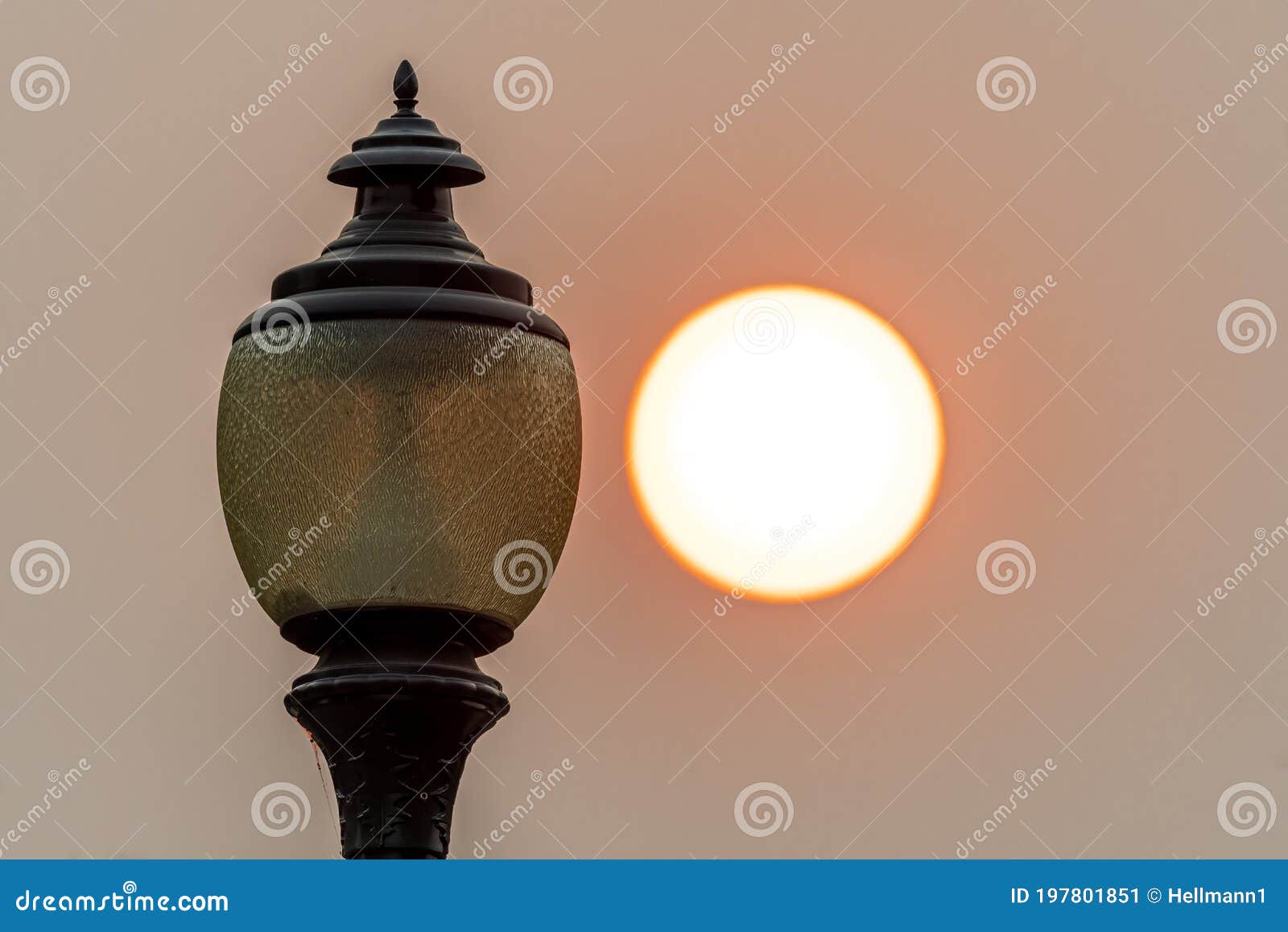 Street Lamp and Rising Sun stock image. Image of building - 197801851