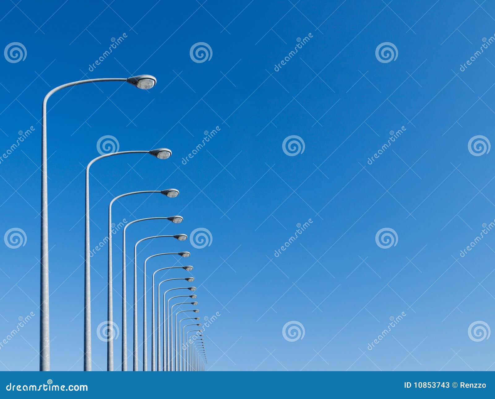 Street lamps aligned stock image. Image of outside, road - 10853743