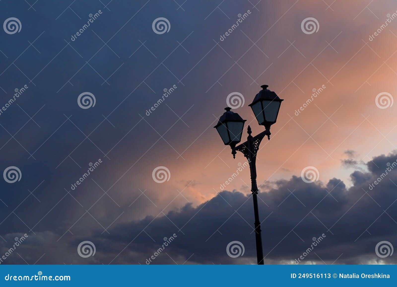Street Light Against Dramatic Sunset Sky after Rain Stock Image - Image ...