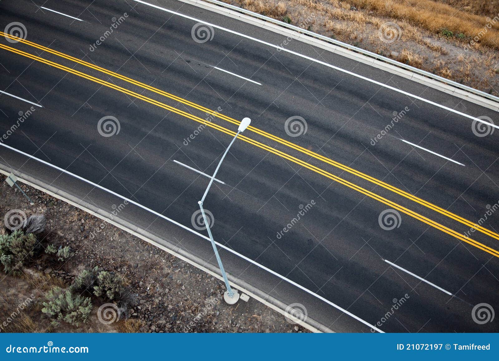 Street light on empty road stock image. Image of drive - 21072197