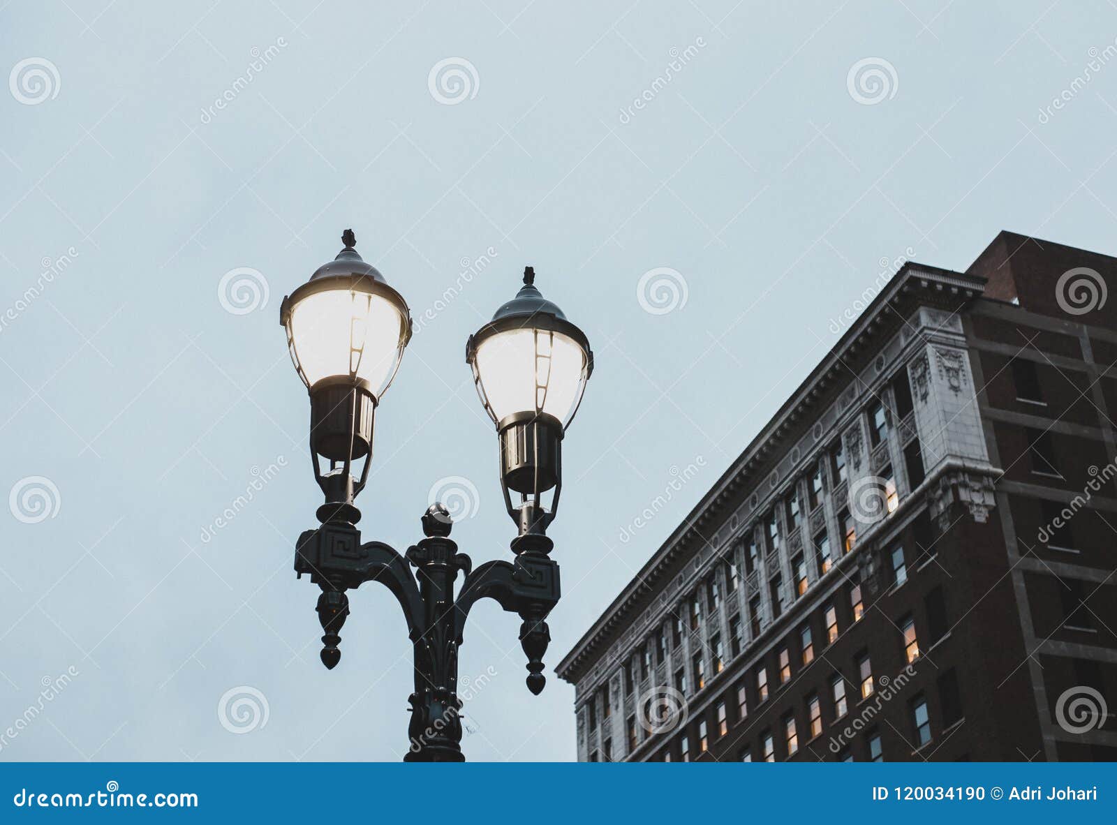 Street Light at Night with Building Behind Stock Photo - Image of light ...