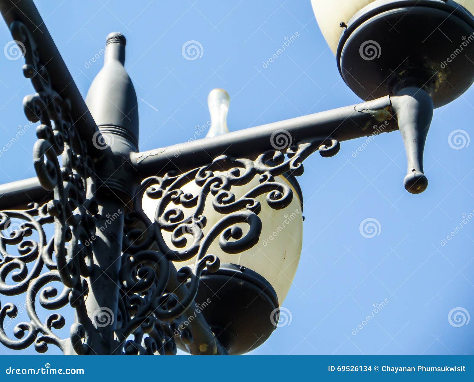 Street Light Post with Four Lamps and Blue Sky Stock Photo - Image of ...
