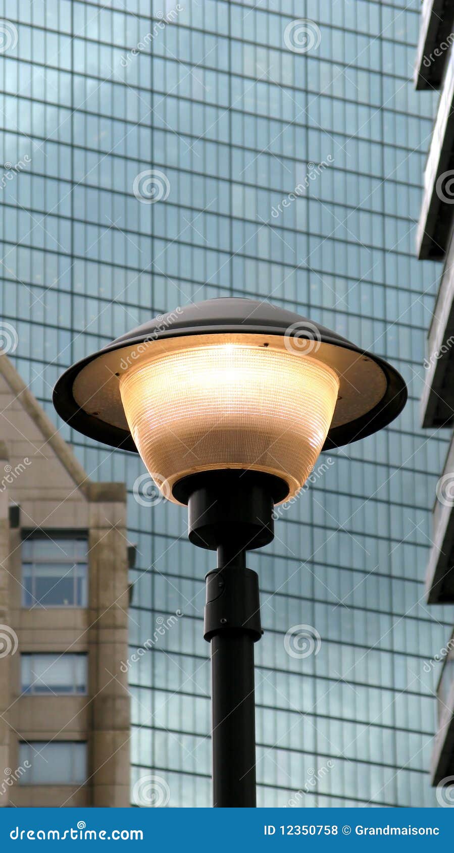 Street Light and Skyscraper Stock Photo - Image of lighted, exterior ...
