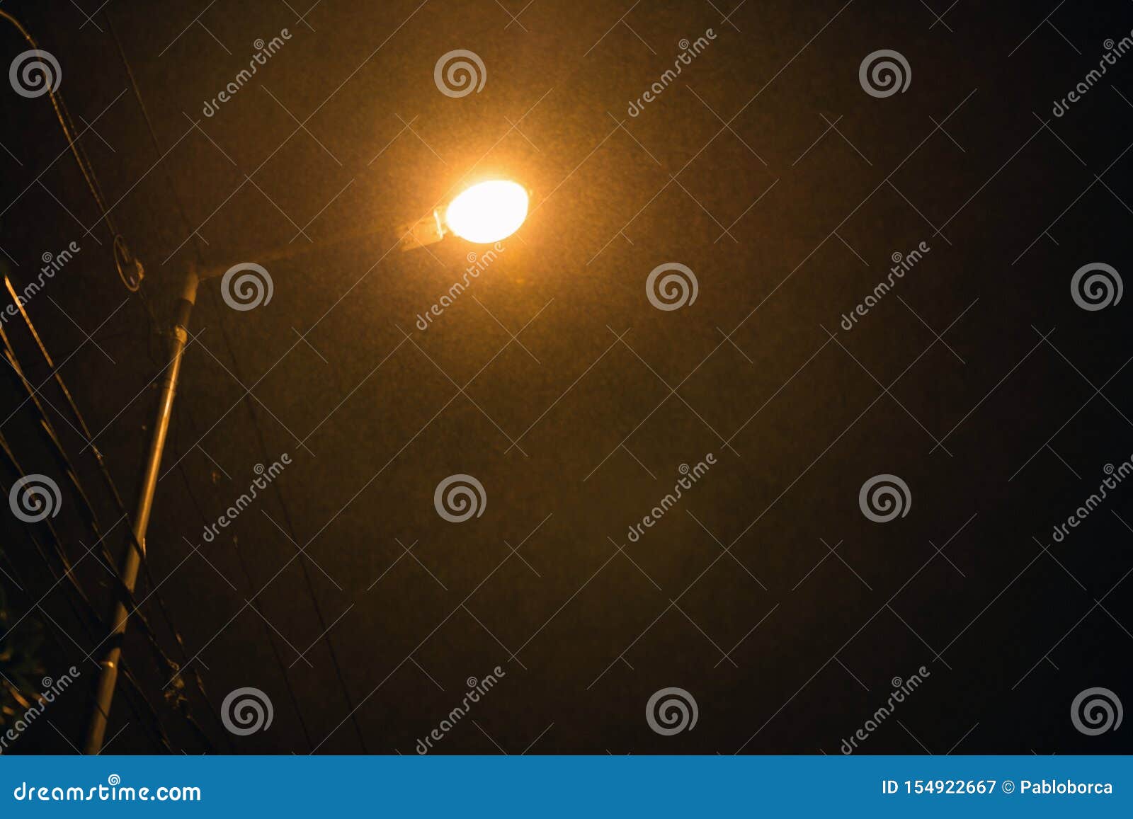 Street Light Under Light Drizzle Stock Image - Image of light, spooky ...