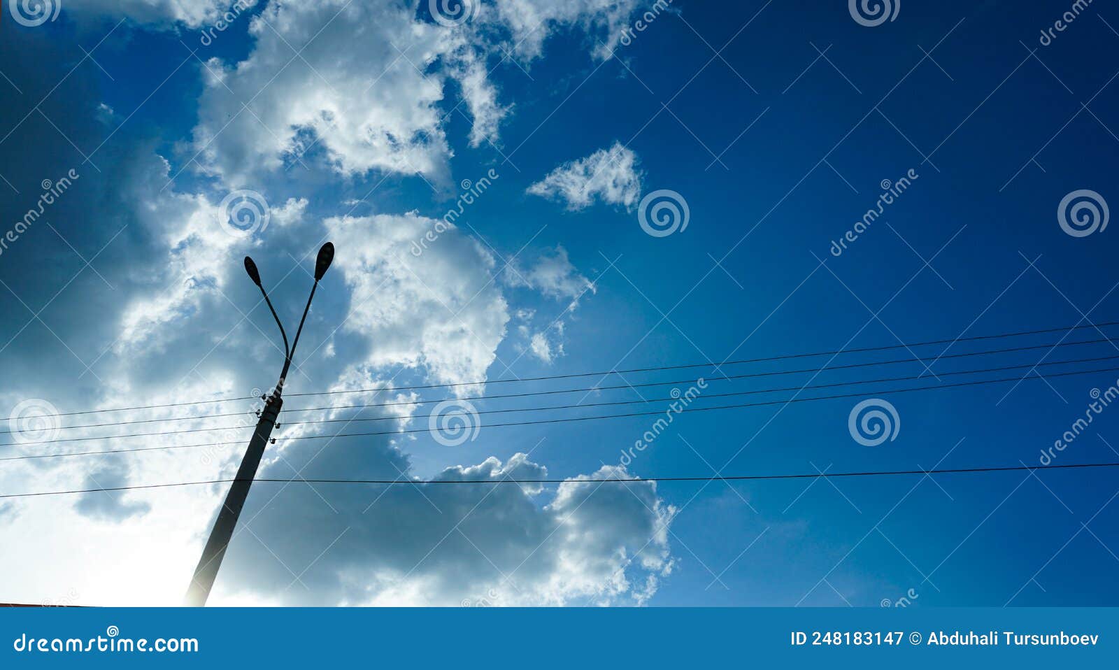 Street lights and blue sky stock image. Image of urban - 248183147