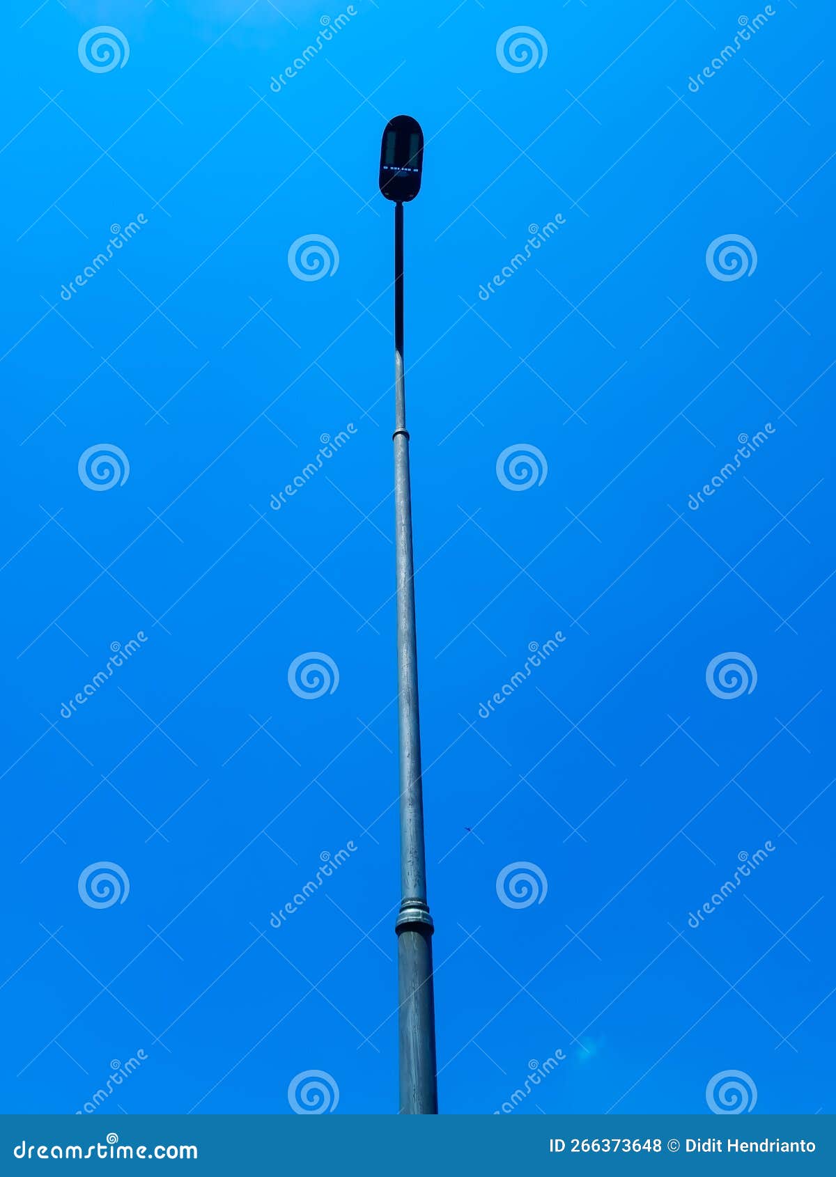 Street Lights in Bright Daylight Stock Photo - Image of wing, lighting ...