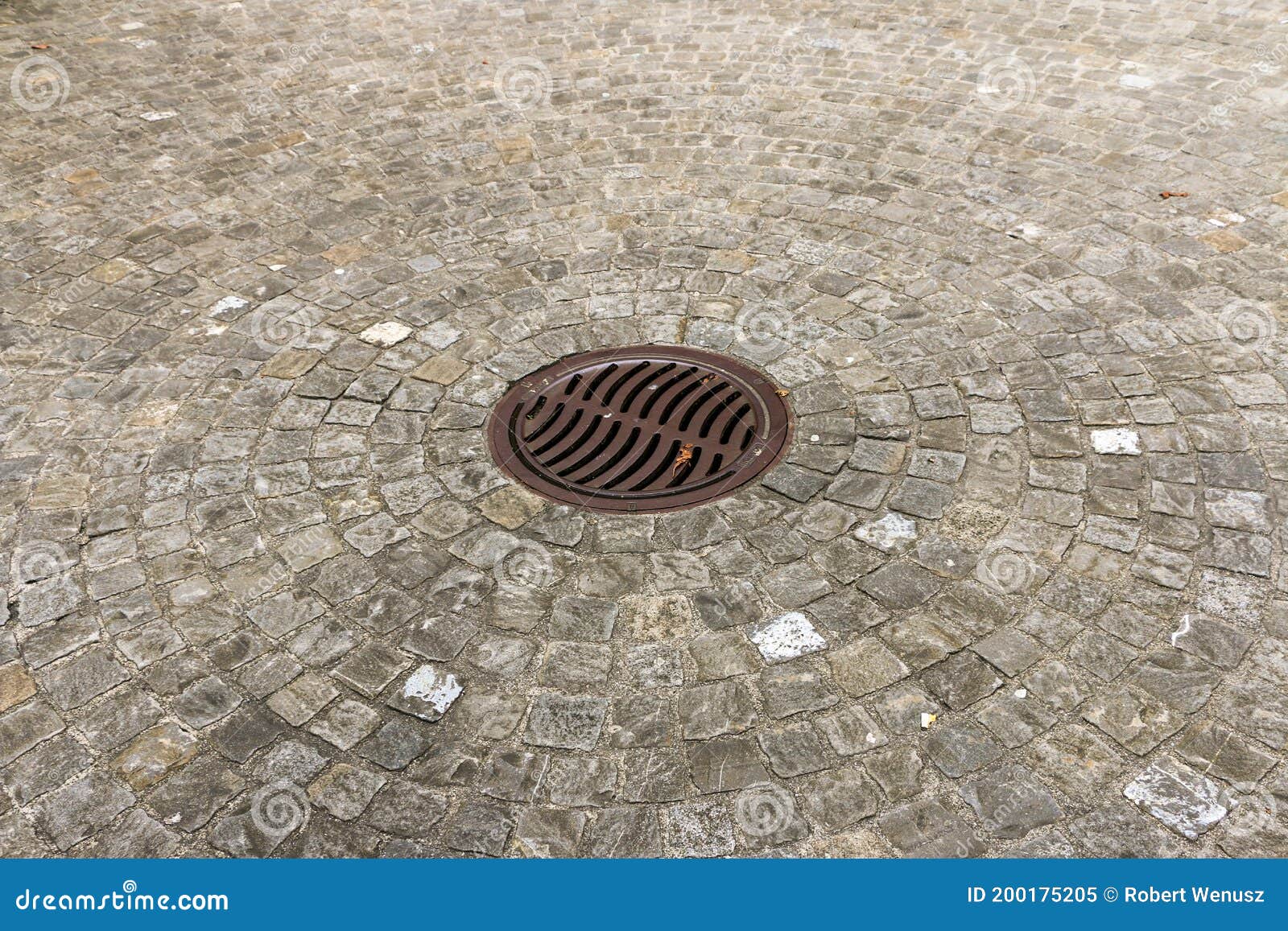 Sewer Metal Hatch On Pavement Stock Photo | CartoonDealer.com #185355576