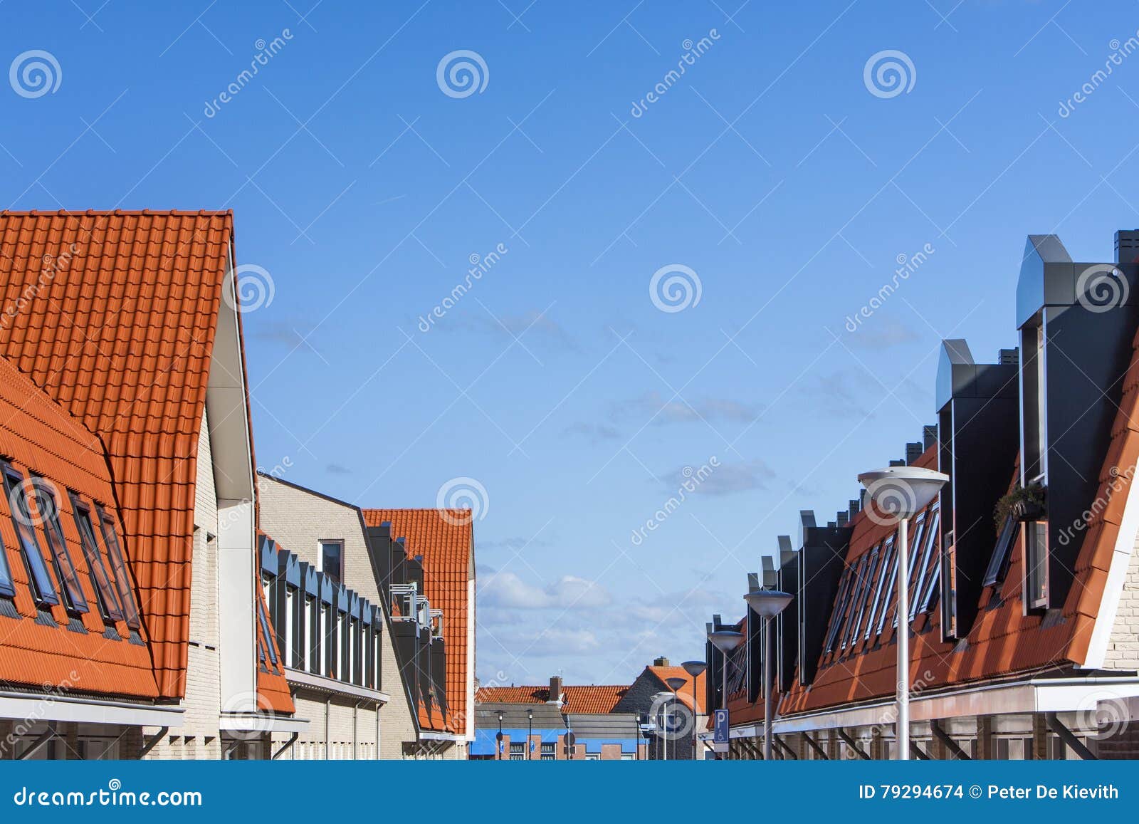 Street of Red Tiled Roofs with Skylights Stock Photo - Image of ...