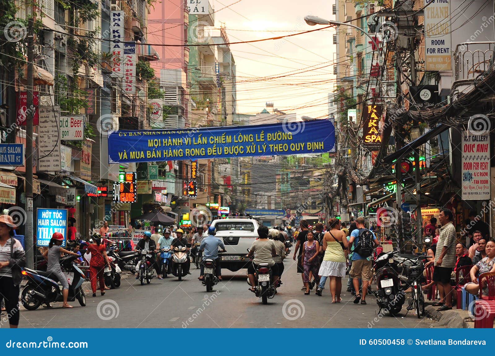Street in Saigon, Vietnam editorial stock photo. Image of dragons ...