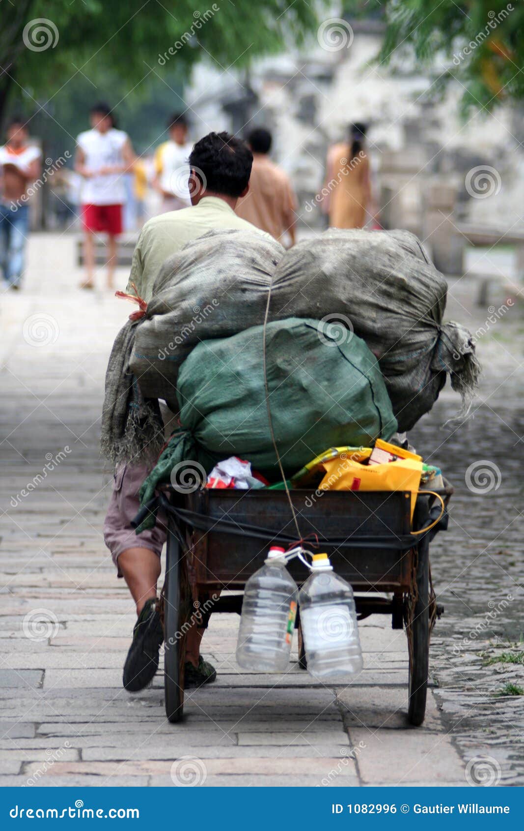 Street scene in China editorial photo. Image of carrying - 1082996