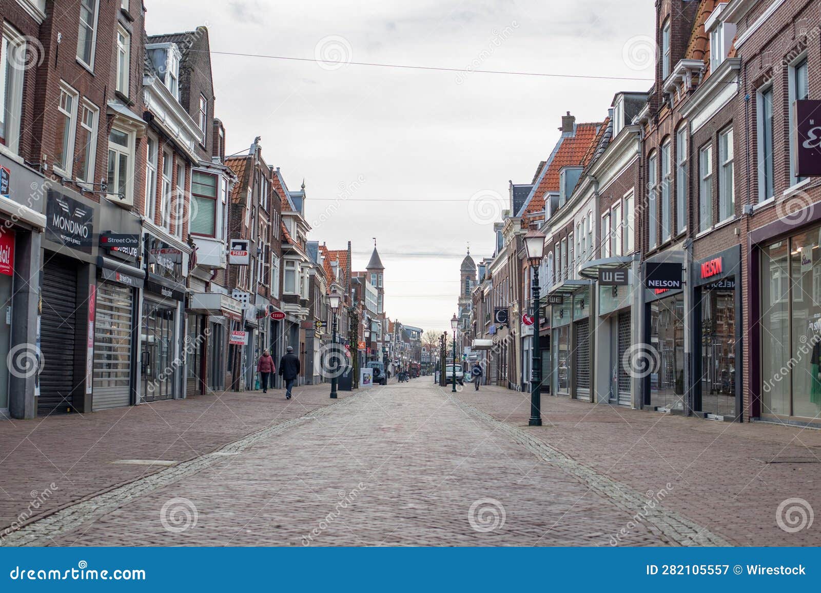 A Street Scene in the City, with People Walking by Editorial ...