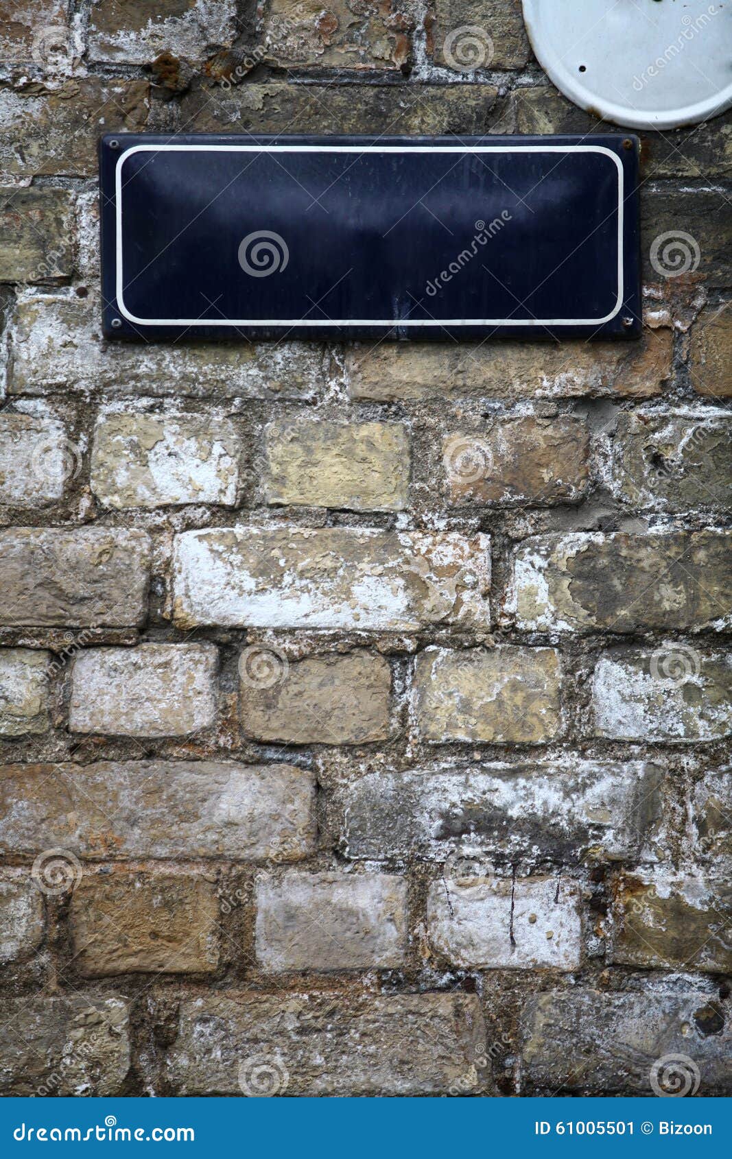 Street Sign on a Brick Wall Stock Image - Image of name, frame: 61005501