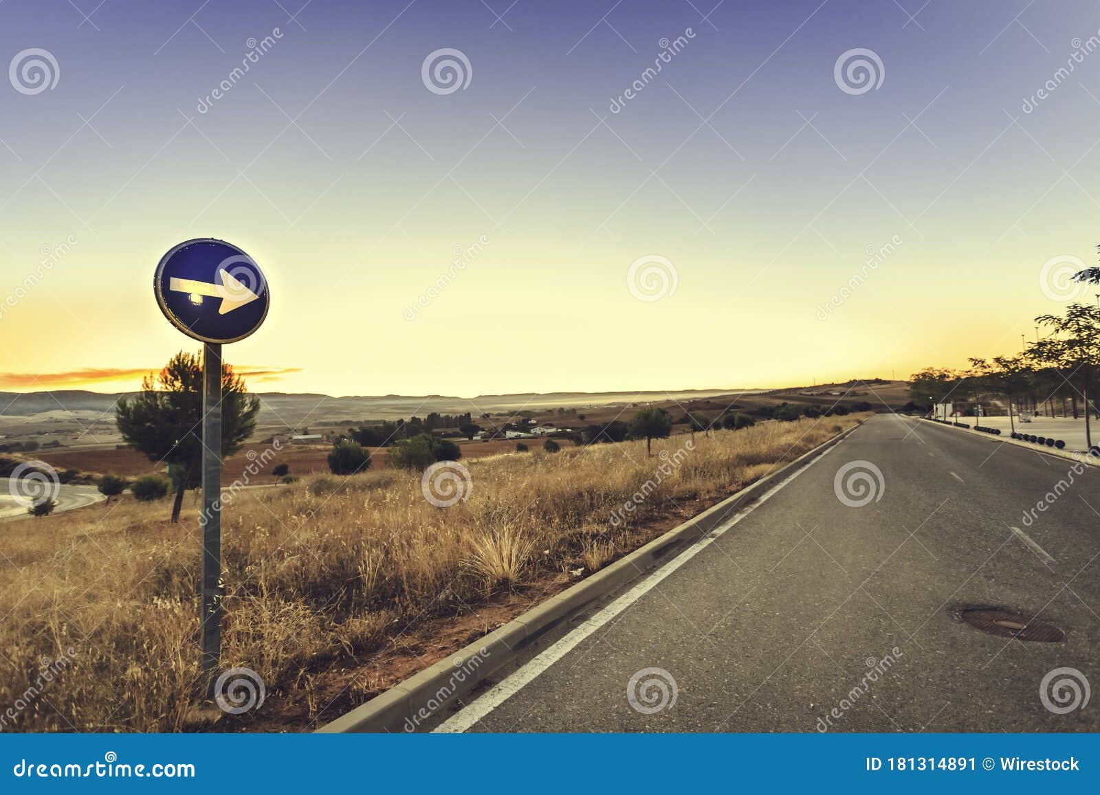 Street Sign Showing the Direction during the Sunset Stock Image - Image ...