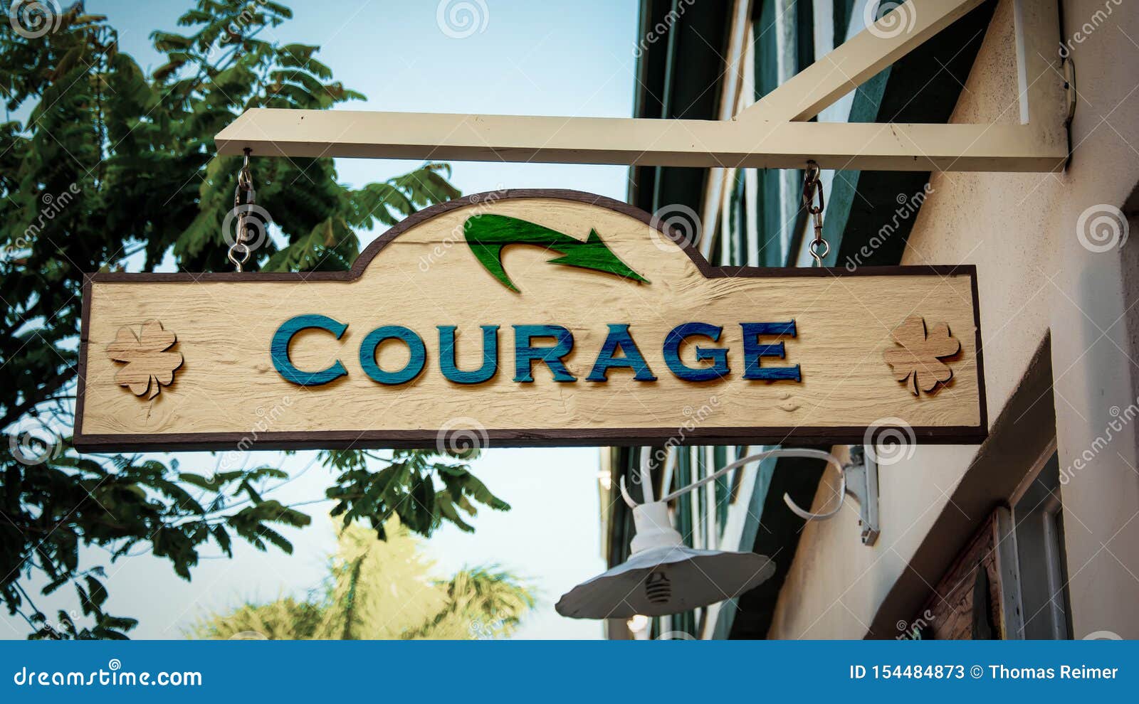 Street Sign to Courage editorial stock photo. Image of careful - 154484873